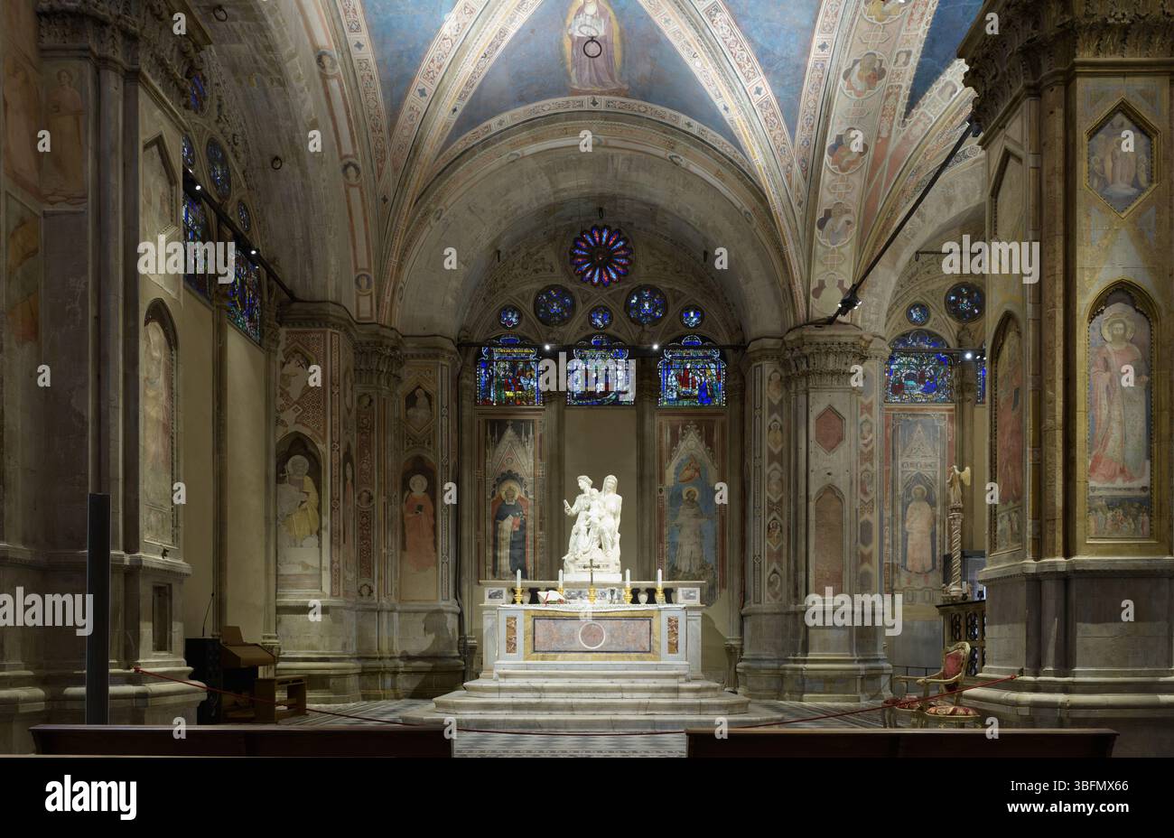 Gothic apse of Orsanmichele with altar of Saint Anne and marble statue ...