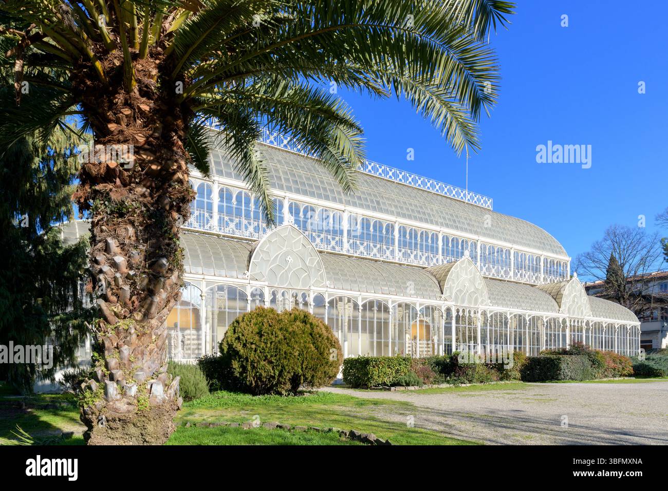 Historic glass and iron greenhouse in the Giardino dell'Orticultura, a ...