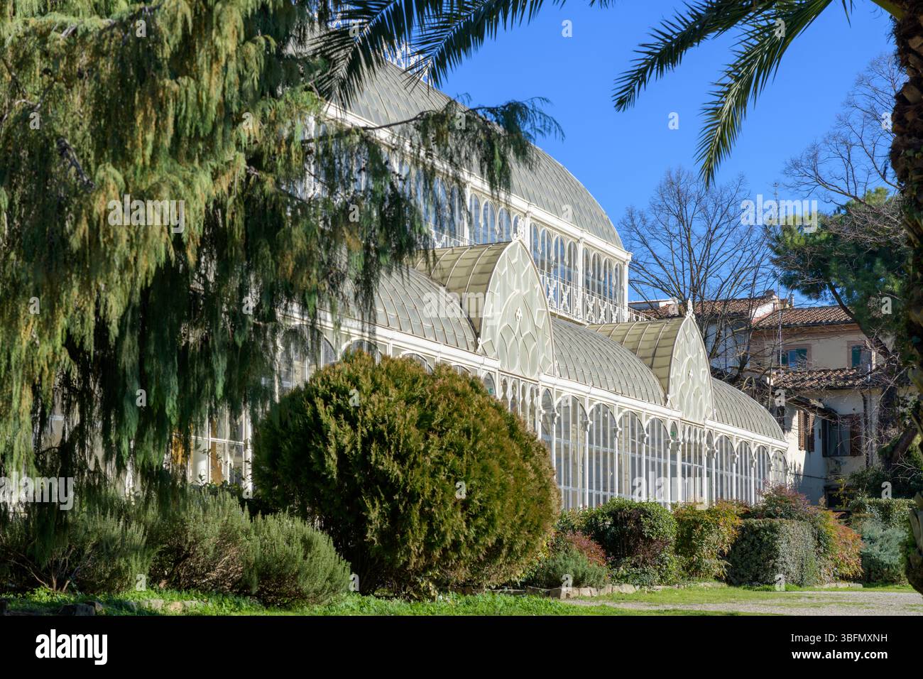 Historic glass and iron greenhouse in the Giardino dell'Orticultura, a ...