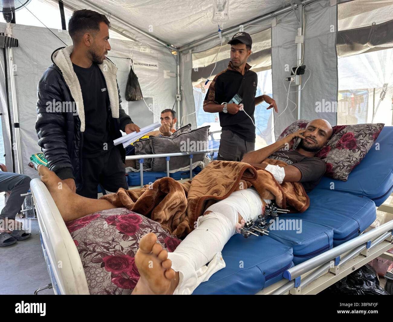 Wounded Palestinians receive medical care in Nasser Hospital Wounded Palestinians receive ...