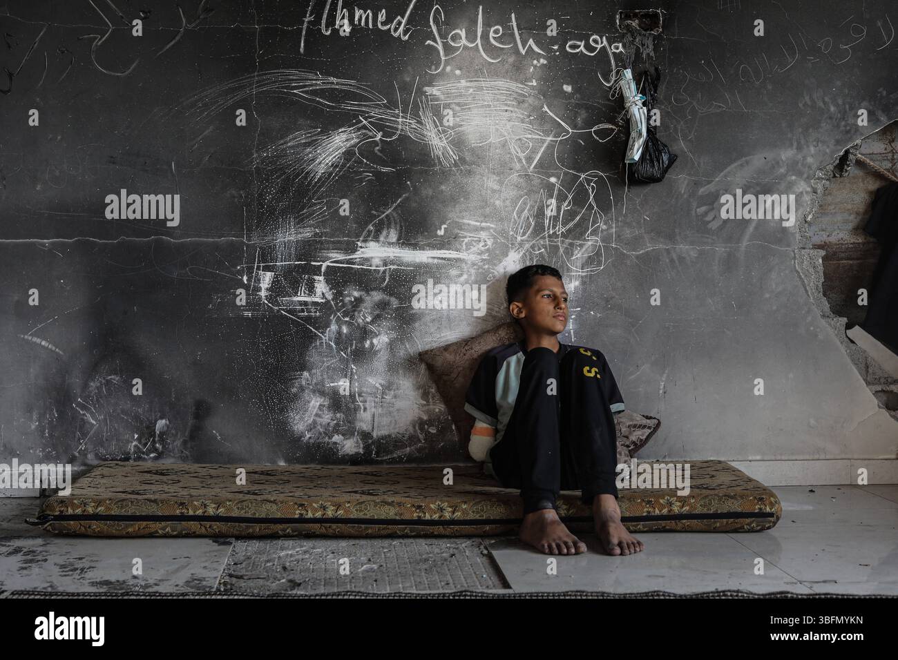 Ahmad Agha, a 14-year-old boy living in a shelter in Gaza City, who was ...