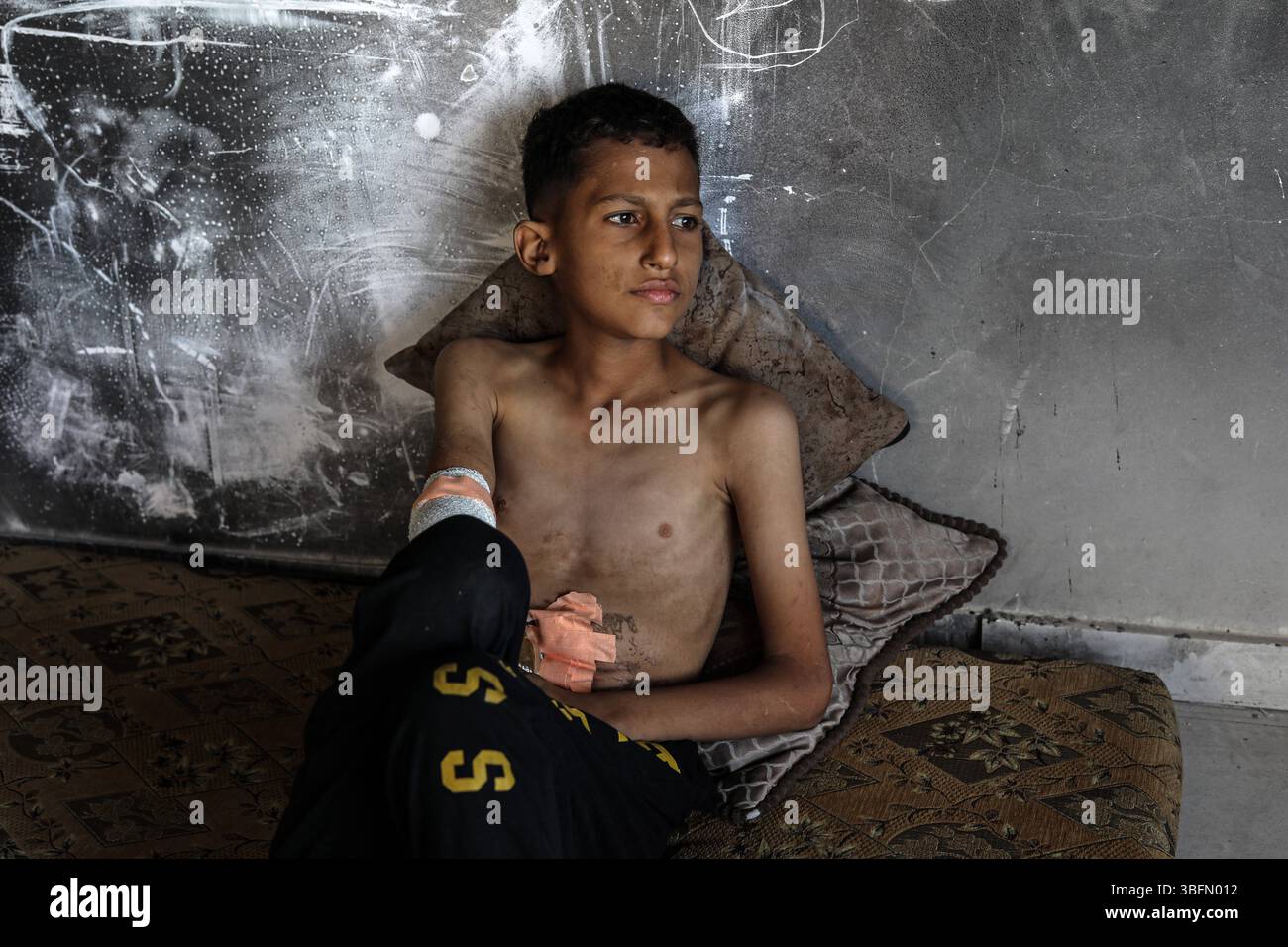 Ahmad Agha, a 14-year-old boy living in a shelter in Gaza City, who was ...