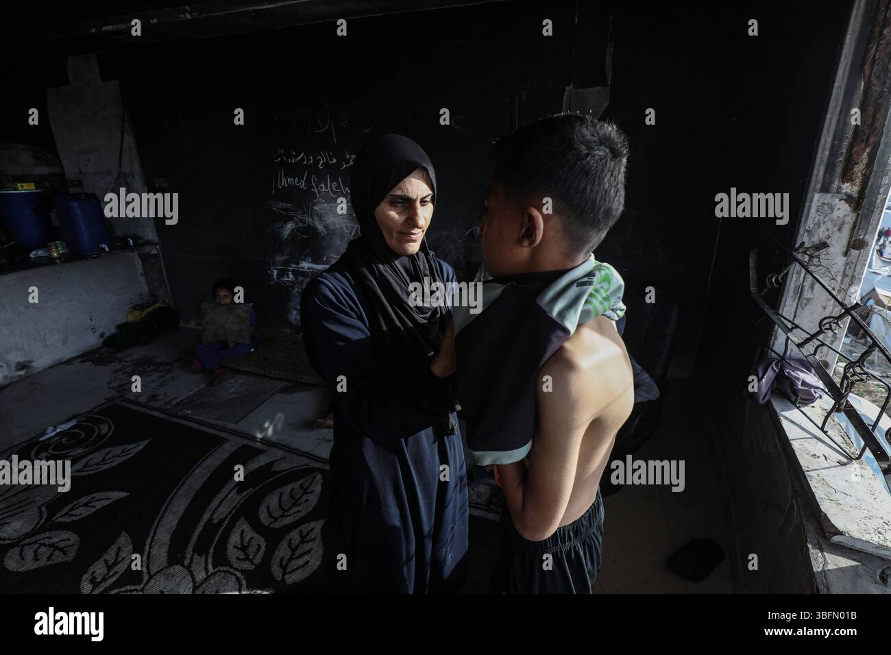 Ahmad Agha, a 14-year-old boy living in a shelter in Gaza City, who was ...