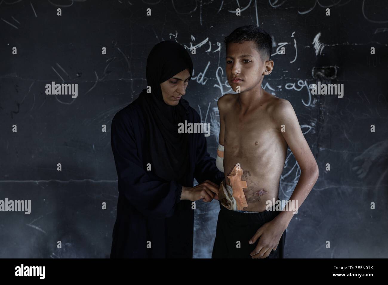 Ahmad Agha, a 14-year-old boy living in a shelter in Gaza City, who was ...
