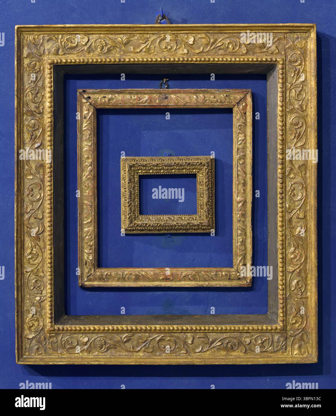 Gilded wooden frame with floral ornamentation from the frame collection ...
