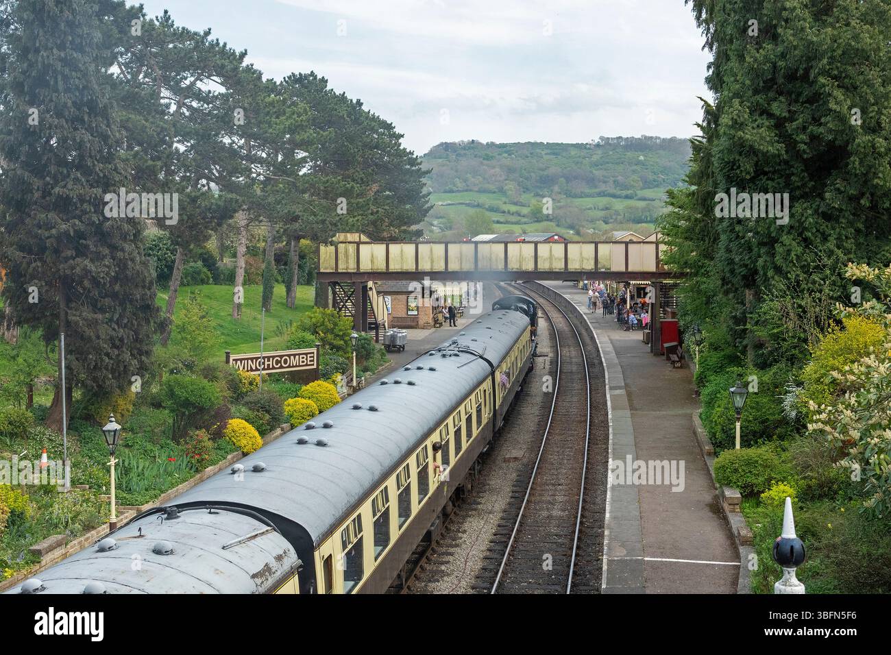 GWSR steam train arriving at railway station, Winchcombe, The Cotswolds, England, Great Britain ...