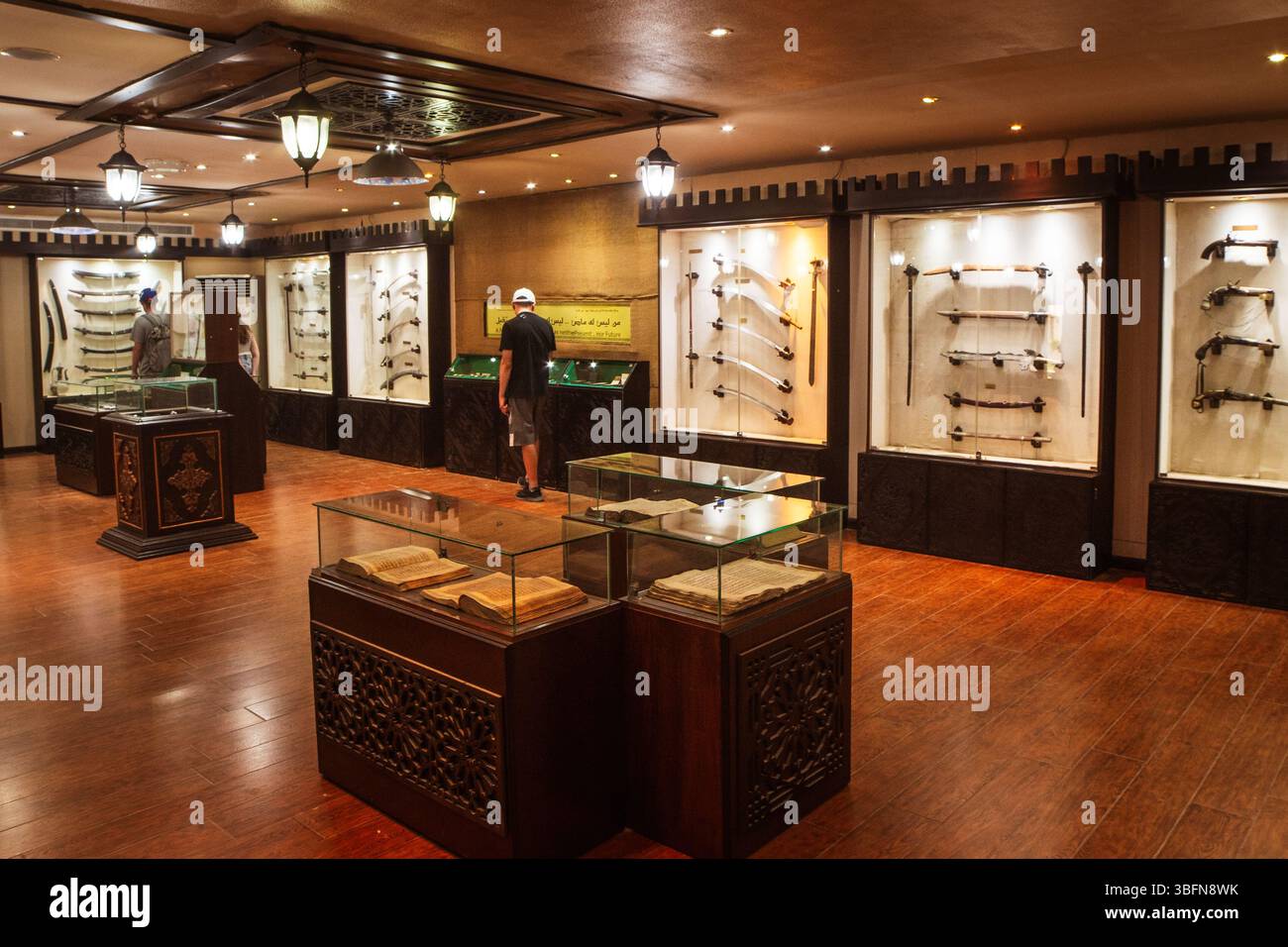 Abu dhabi, UAE - 27th april, 2025: Visitors admire sword collection ...