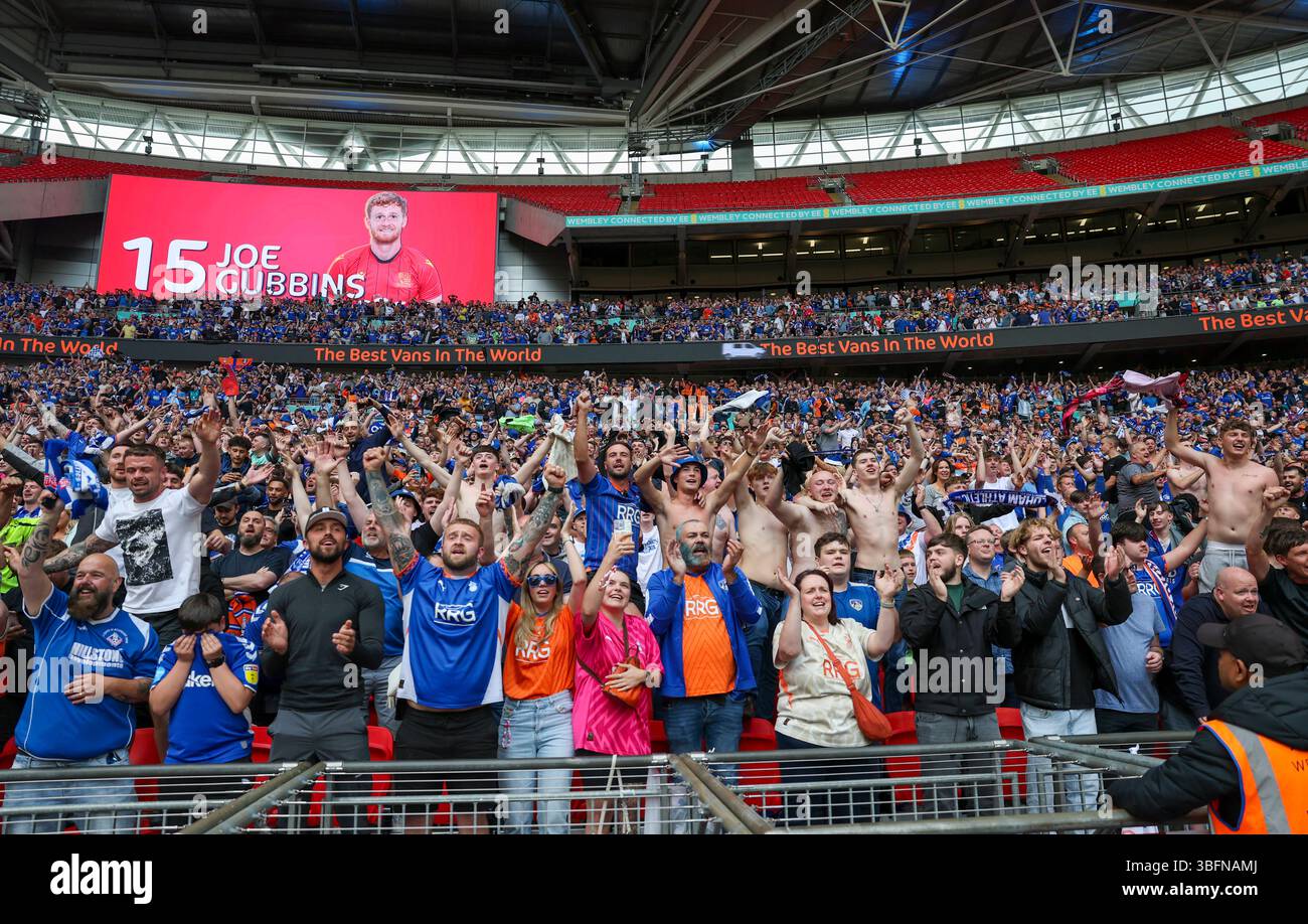 Oldham fans celebrate during the Oldham Athletic AFC v Southend United ...