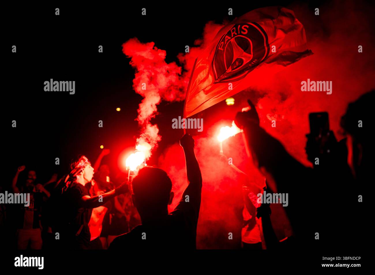 Paris saint germain fans light flares hi-res stock photography and ...