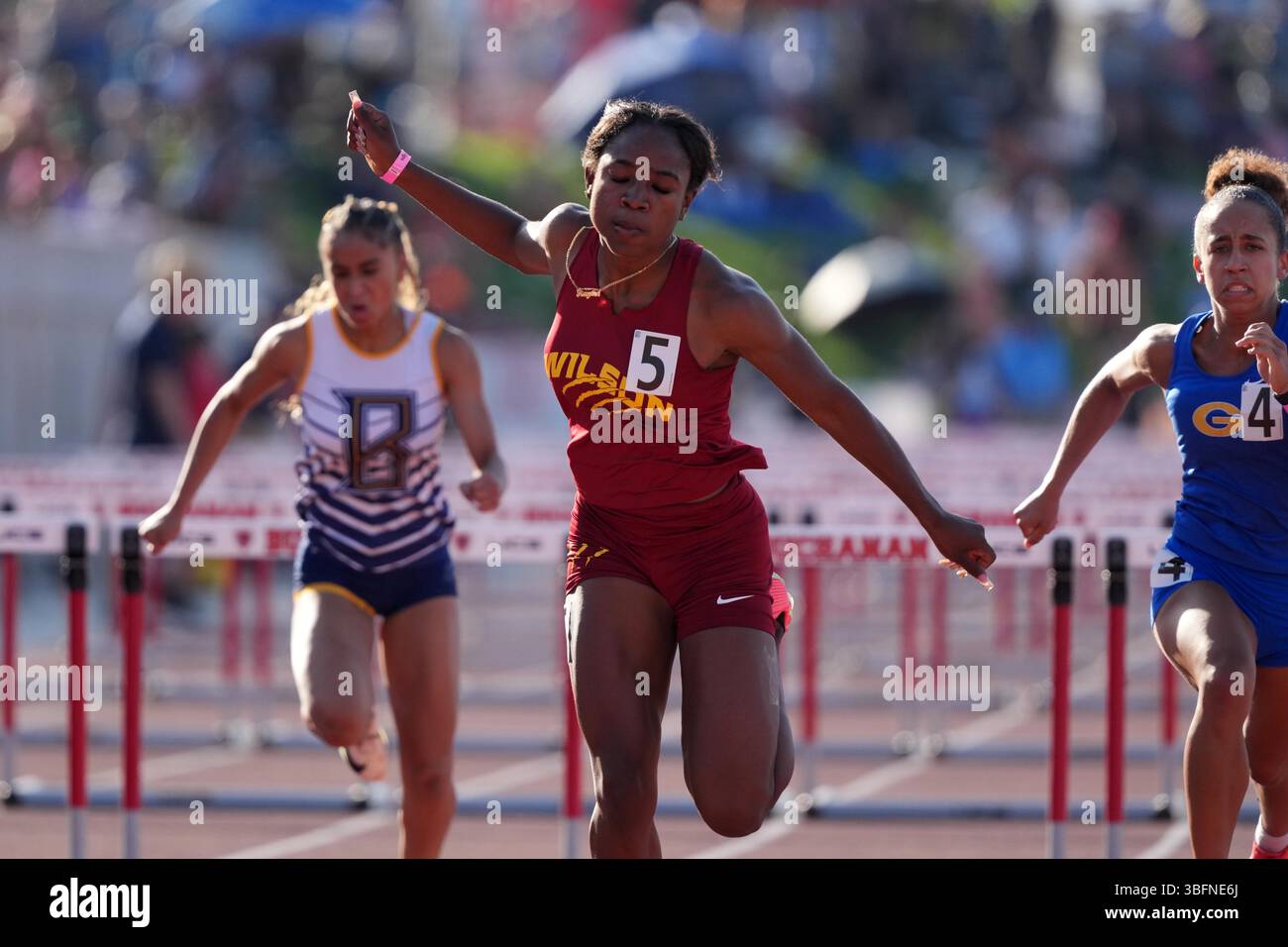 Kaylin Edwards of Long Beach Wilson wins girls 100m hurdles heat in 13. ...
