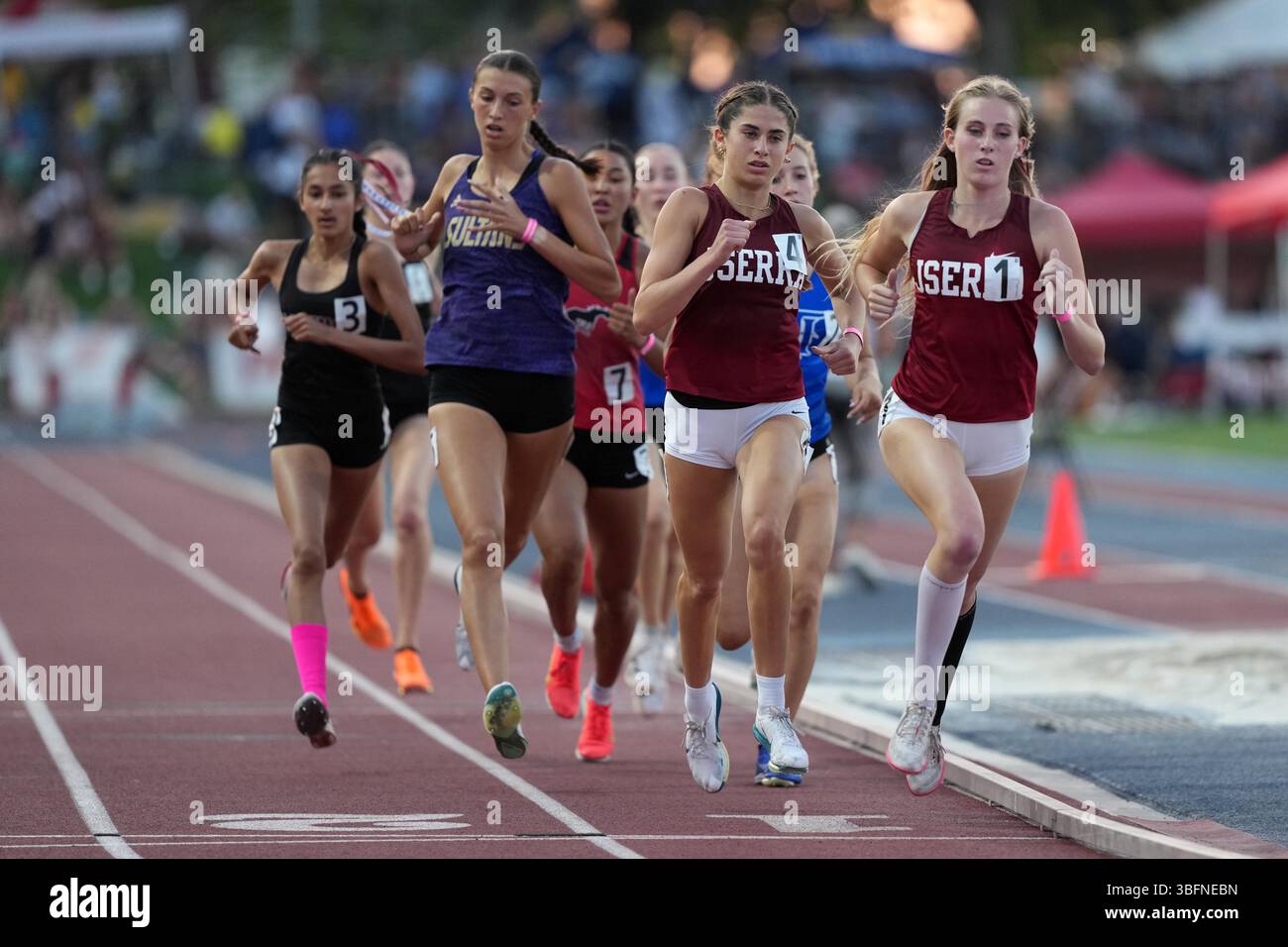 Anne Elise Packard (right) and Chloe Elbaz of JSerra place first and second in girls 800m heat ...