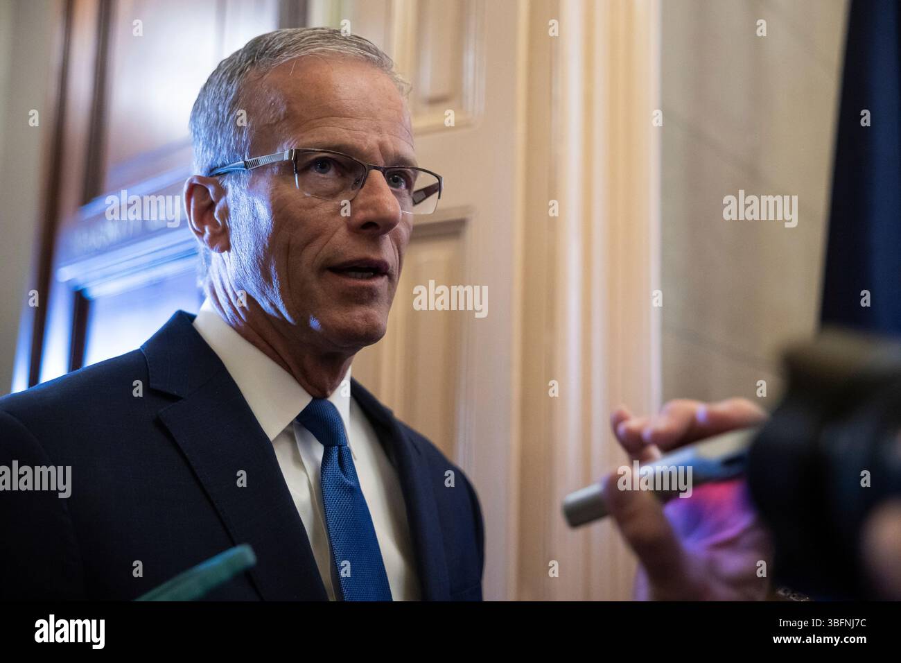 Senate Majority Leader John Thune (R-S.D.) speaks with reporters outside his office at the U.S ...