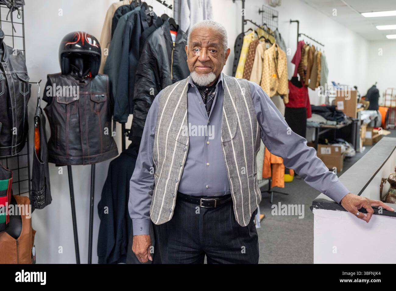 Master tailor, Jim "Gentleman Jim" McFarland, poses for a portrait on ...
