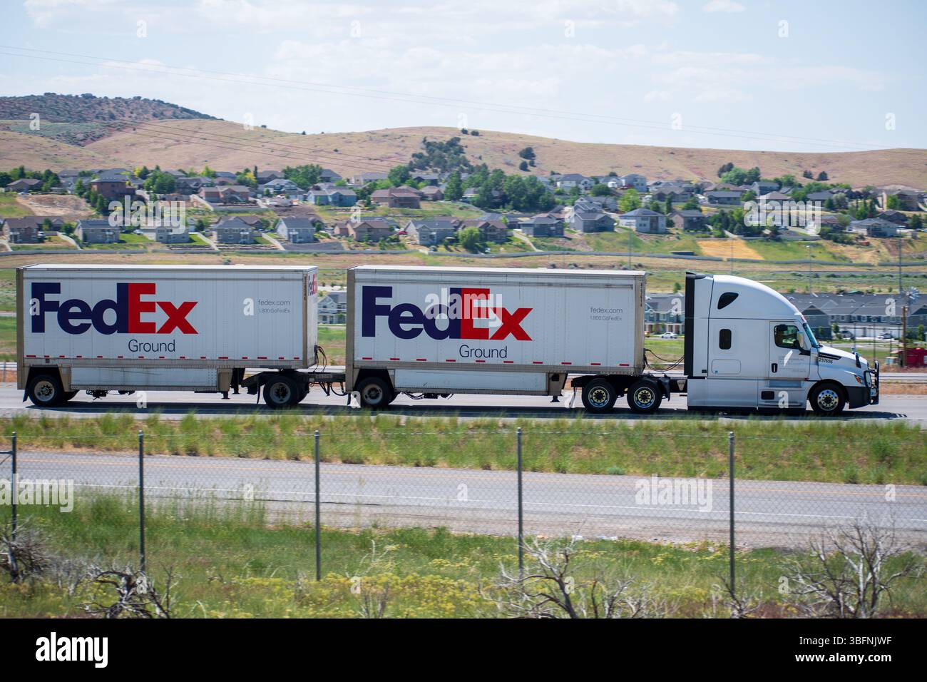 Santaquin, Utah – June 2, 2025: A FedEx truck with double trailers ...