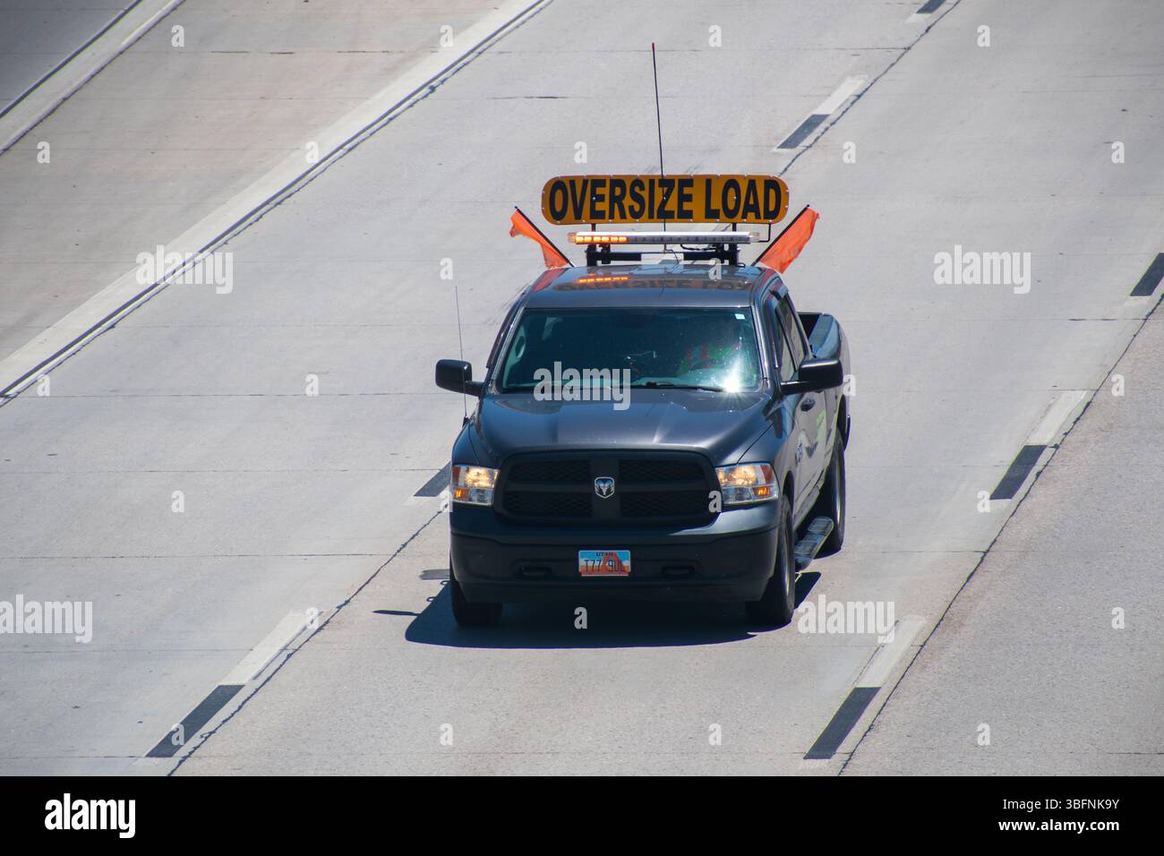 Orem, Utah – June 2, 2025: A pickup truck with an “OVERSIZE LOAD” sign ...