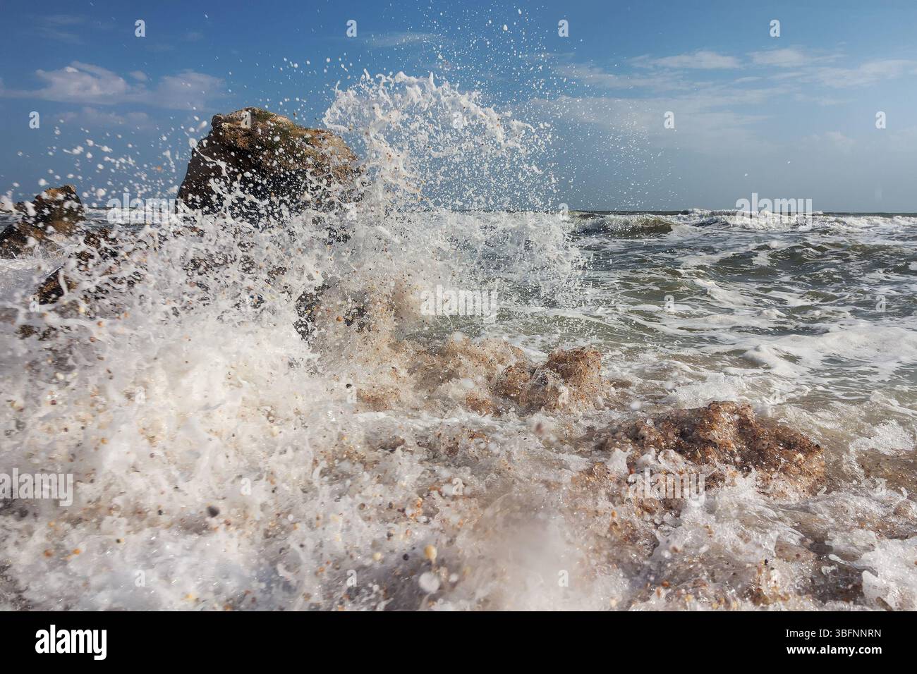 Strong waves crash against black hi-res stock photography and images ...