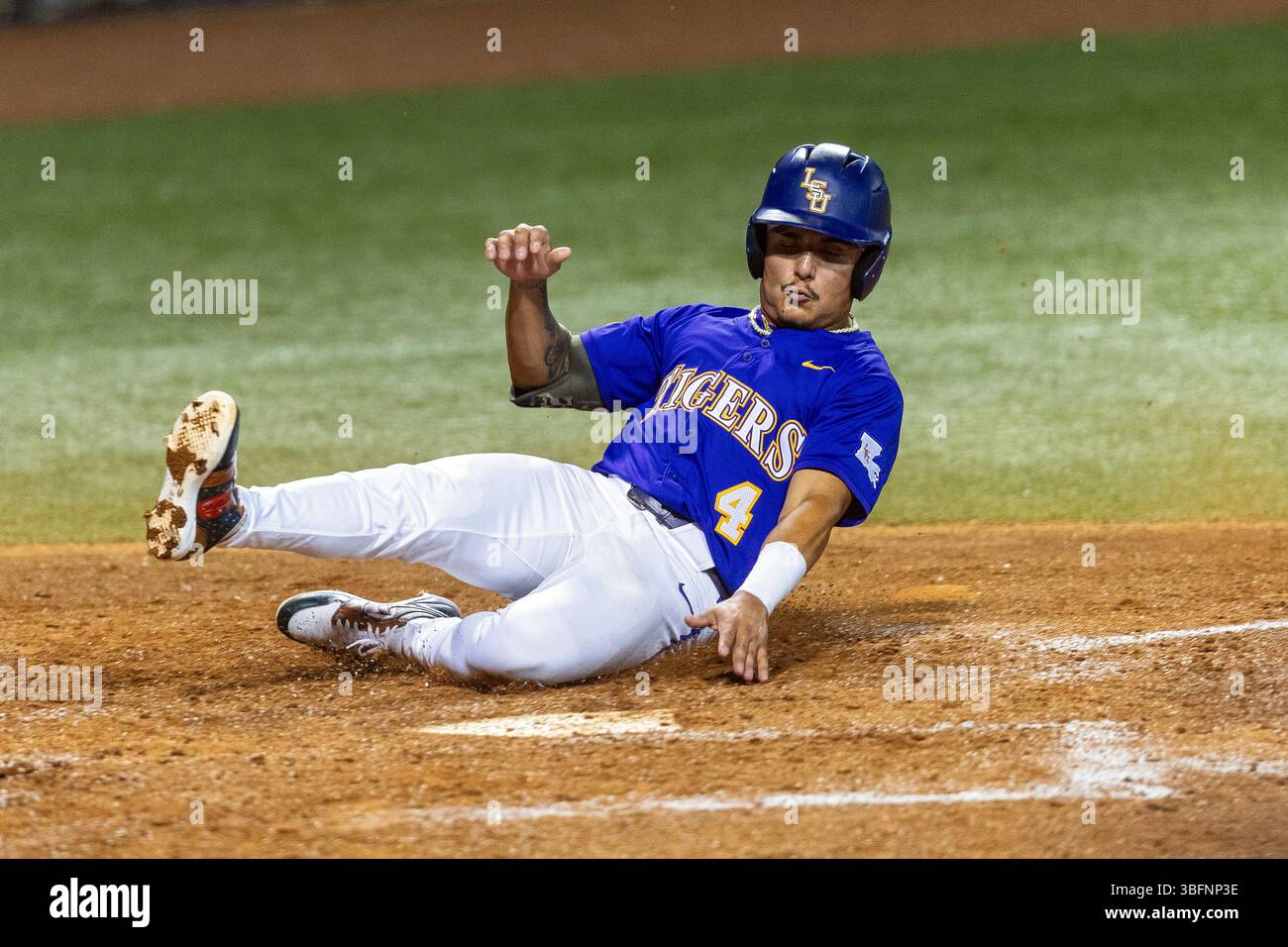 BATON ROUGE, LA - MAY 31: LSU Tigers Infield Steven Milam (4) scores a ...