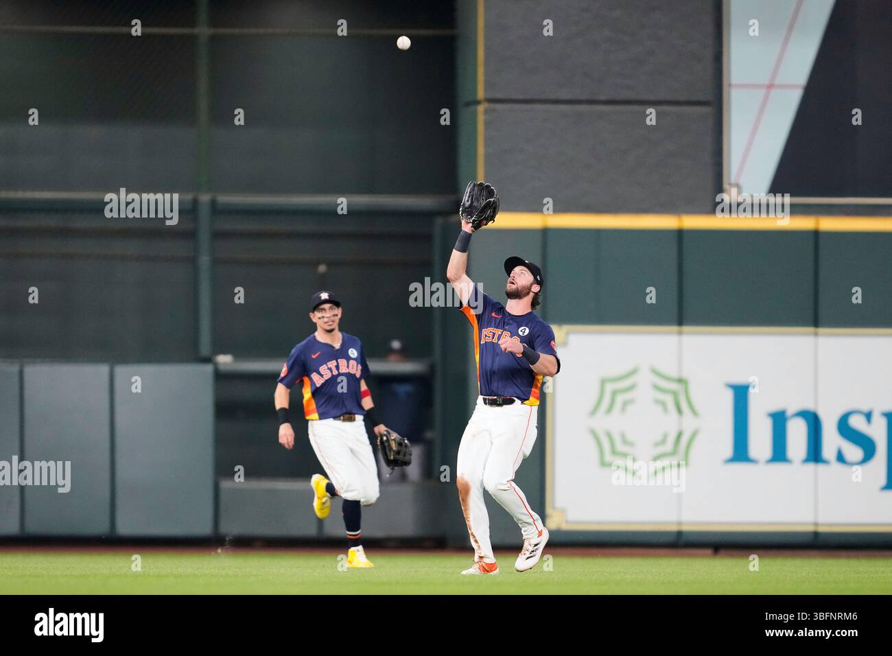 Houston Astros center fielder Jacob Melton (31) catches a fly ball hit ...