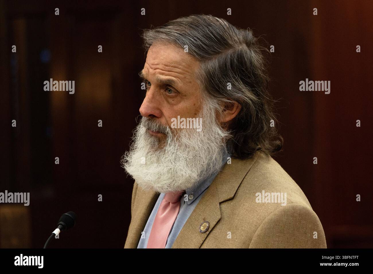 State Rep. George Rauscher of Sutton speaks on the House floor in ...
