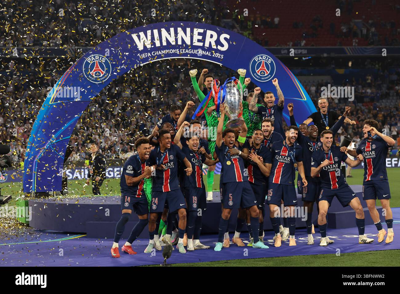 Munich, Germany. 31st May, 2025. Marquinhos of PSG lifts the trophy as ...