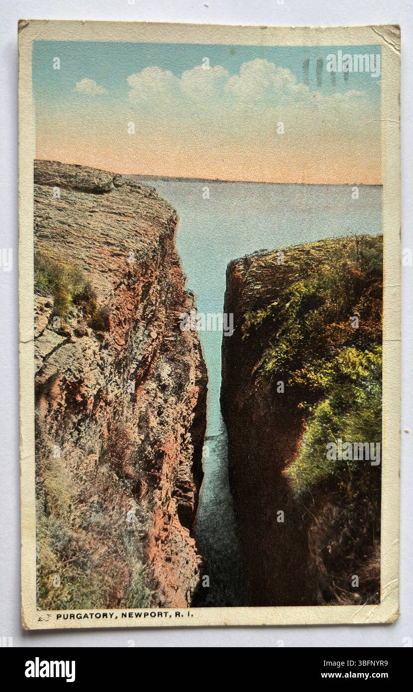 Vintage colour postcard showing a dramatic cliff by the sea, capturing ...