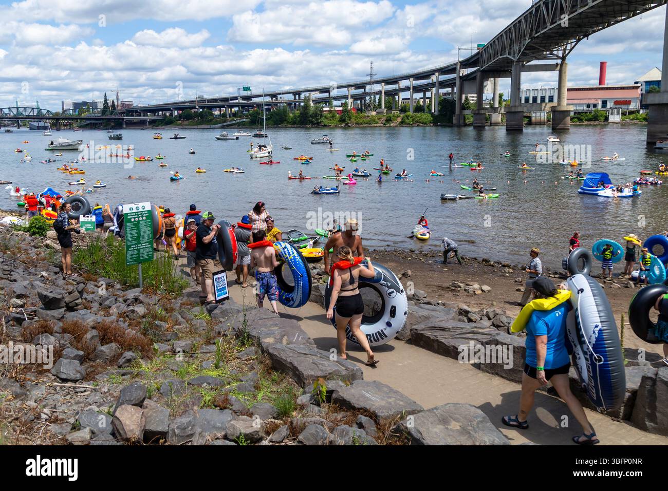The Big Float, Portland, Oregon - July 13th 2019: People gather with ...