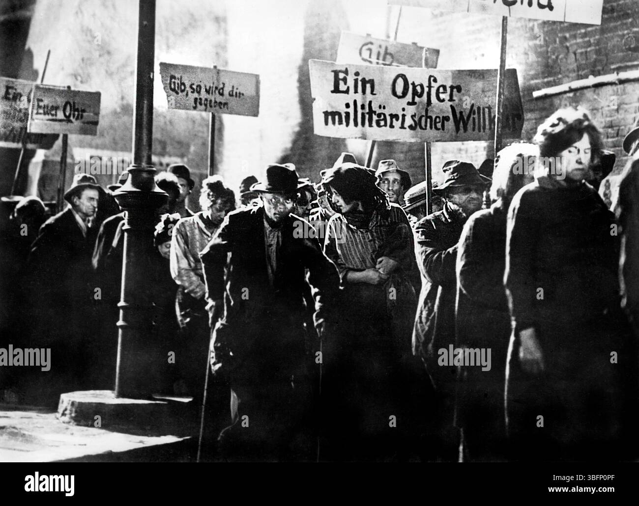 Beggars marching in protest scene, on-set of the German musical film ...