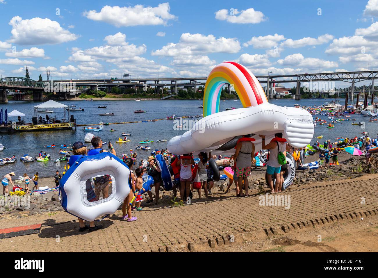 The Big Float, Portland, Oregon - July 13th 2019: People carry ...