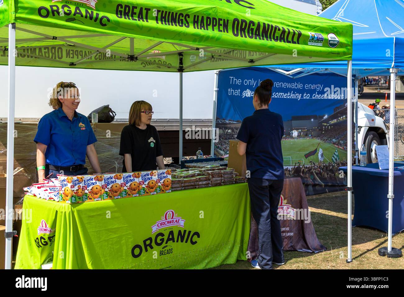 The Big Float, Portland, Oregon - July 13th 2019: Two women sell ...