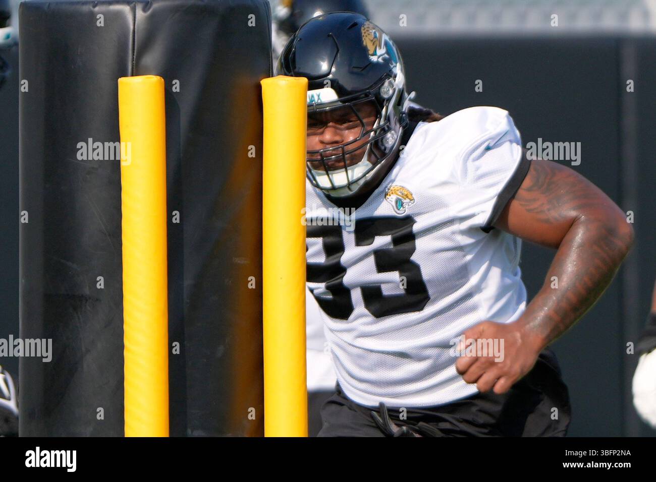 Jacksonville Jaguars defensive tackle Tyler Lacy performs a drill ...