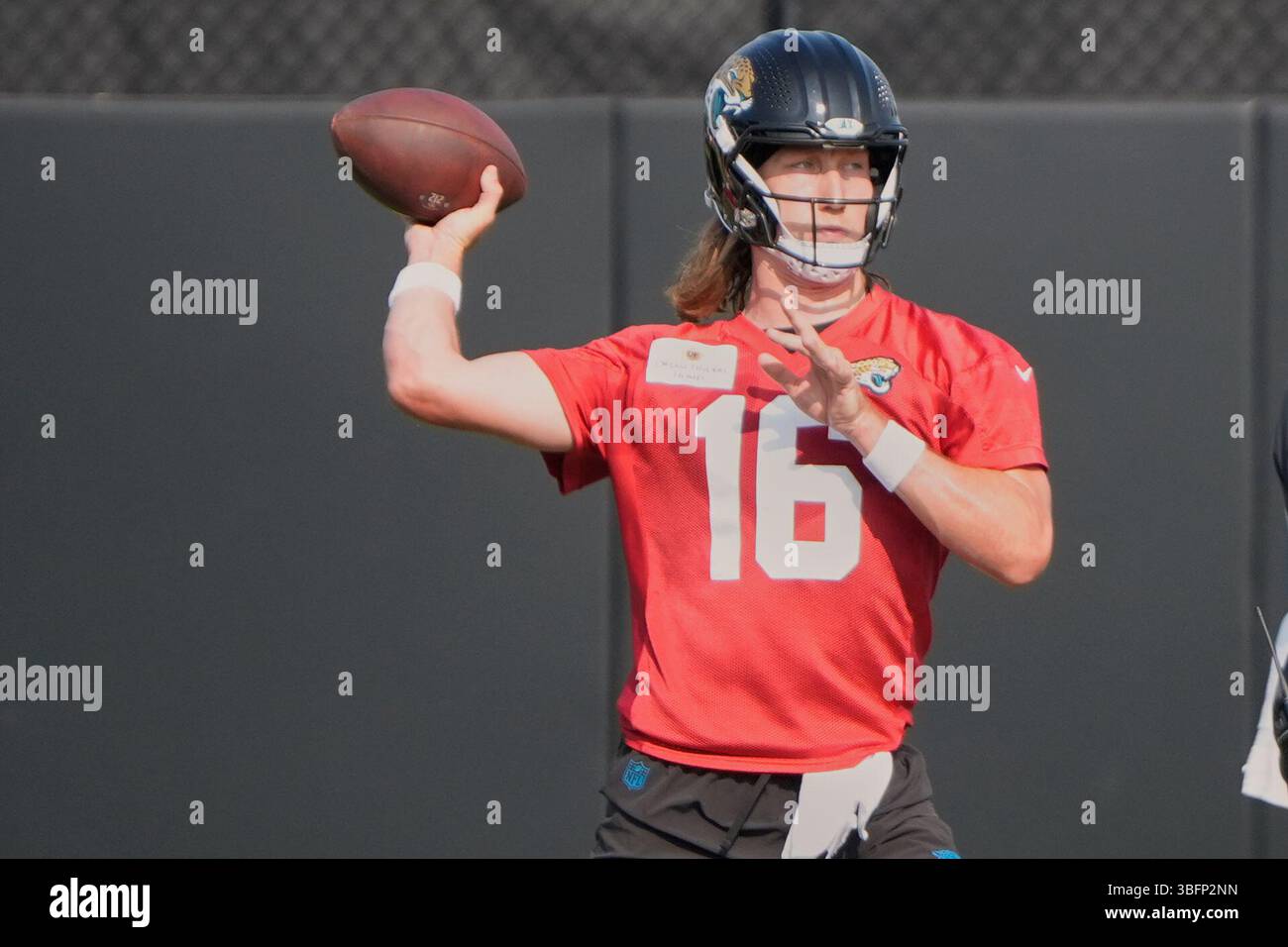Jacksonville Jaguars quarterback Trevor Lawrence (16) looks for a ...