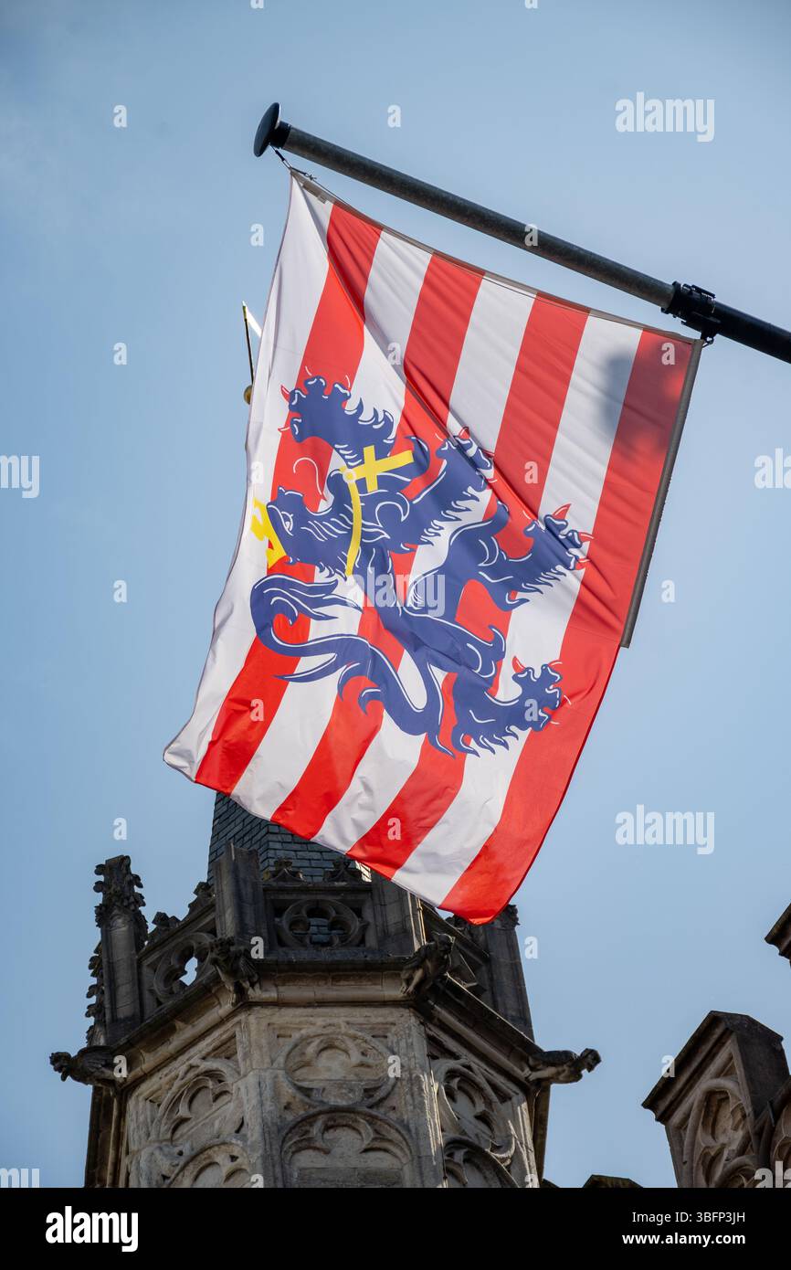 Bruges city flags fly outside the Provincial Court building, Markt ...