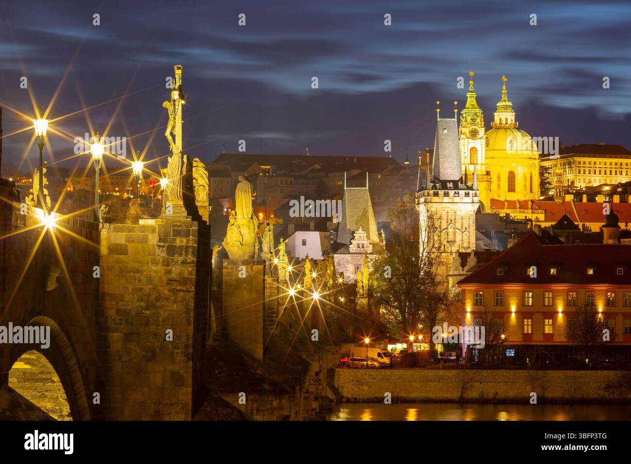 Night view of Charles Bridge with statues and lights in Prague Czech ...