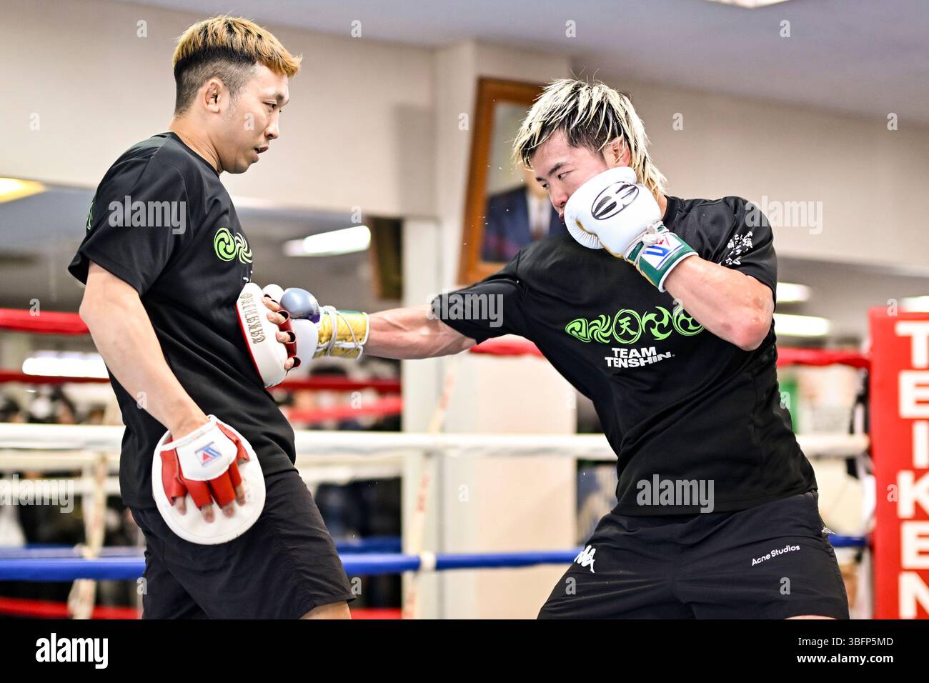 Tenshin Nasukawa of Japan and his trainer Takahiro Aou during a public ...