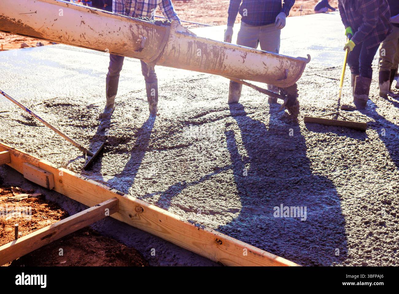 Construction crew pouring concrete hi-res stock photography and images ...