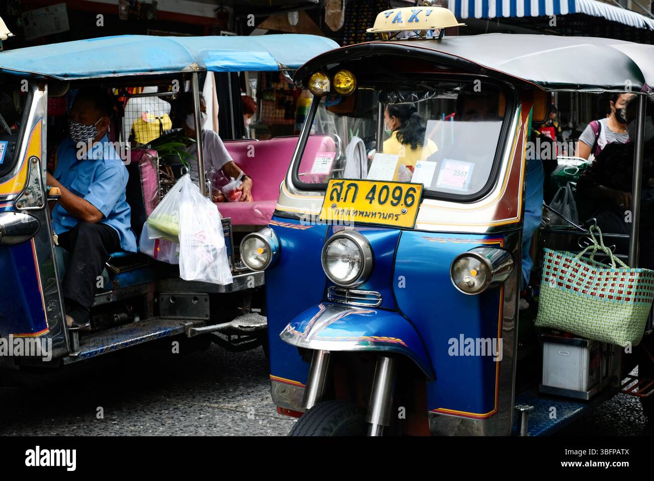 Tuk tuks and street food cart in bangkok street hi-res stock ...