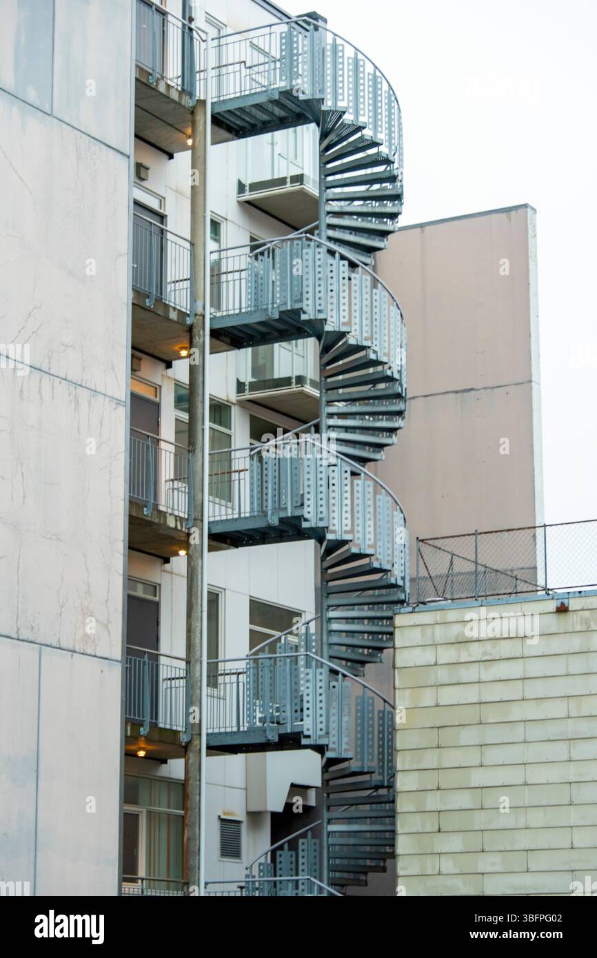 Spiral Staircase in Apartment Building Stock Photo - Alamy