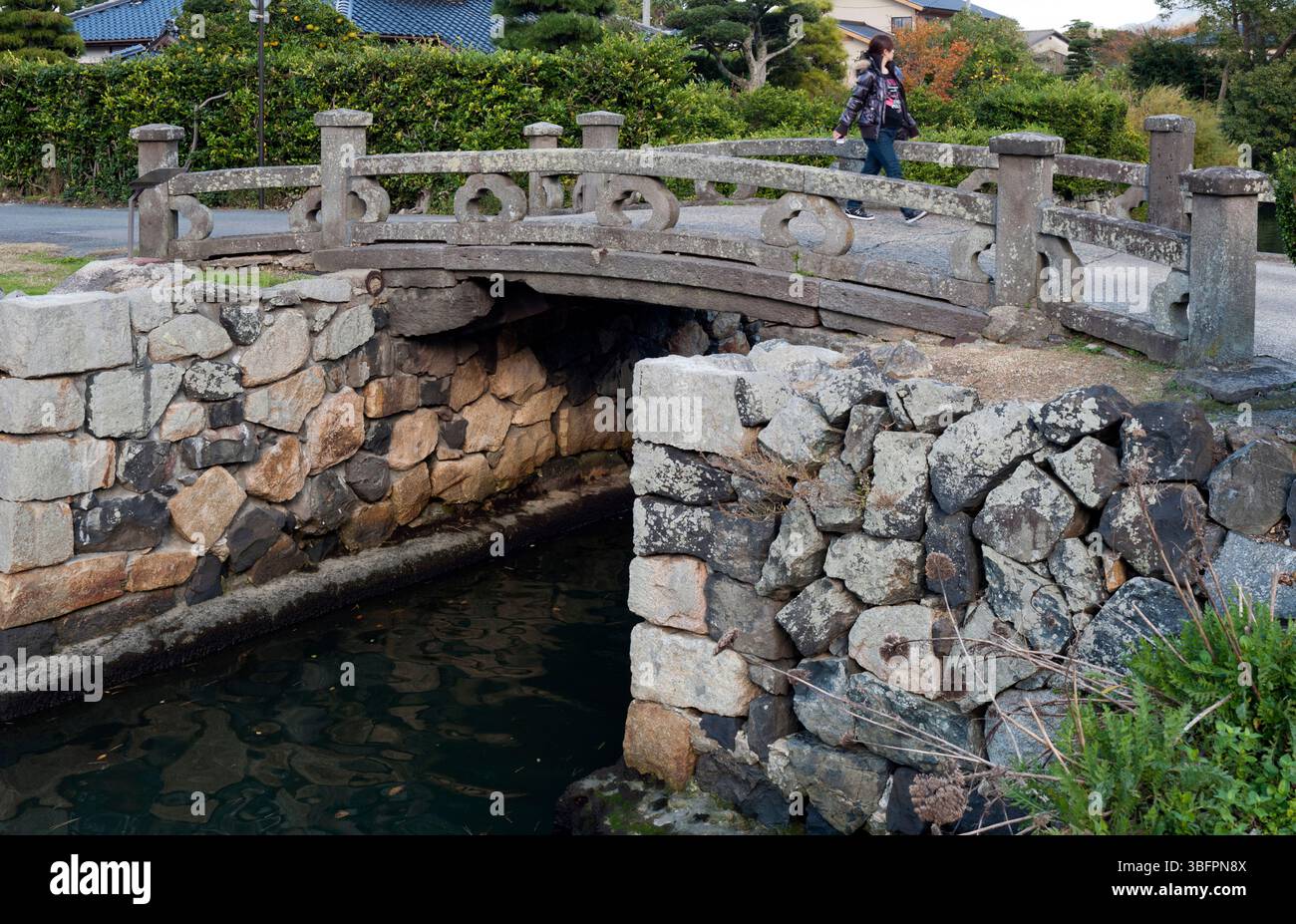 Heian Bridge made of stone over the former Hagi Castle outer moat built ...