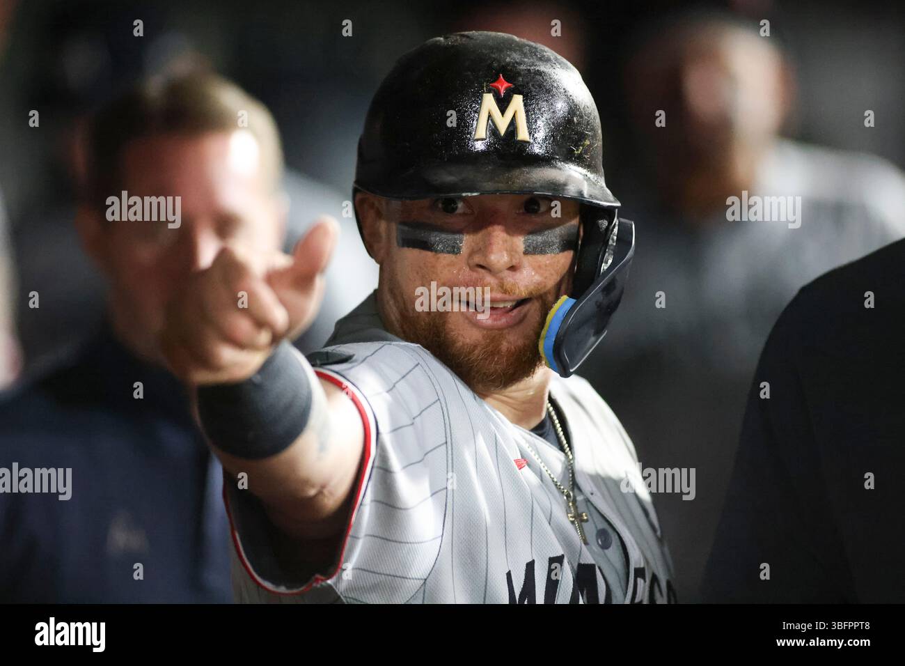 Minnesota Twins' Christian Vázquez celebrates in the dugout after ...