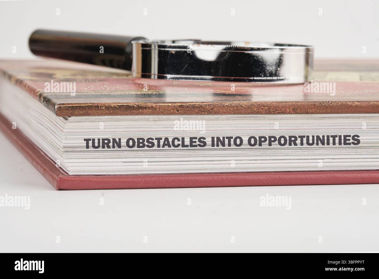 Motivational quote TURN OBSTACLES INTO OPPORTUNITIES Stock Photo - Alamy