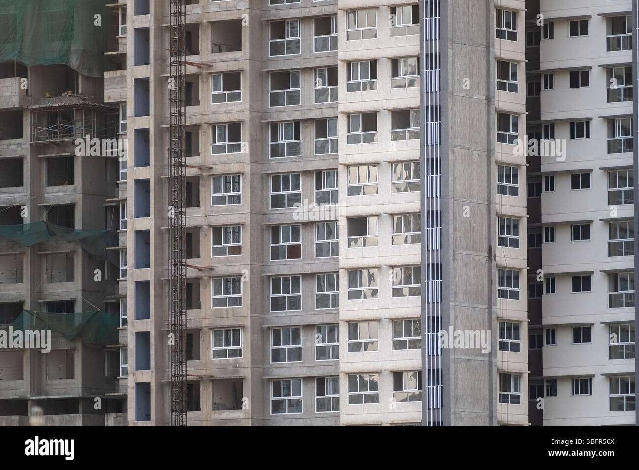 Multiple residential buildings in various stages of construction ...