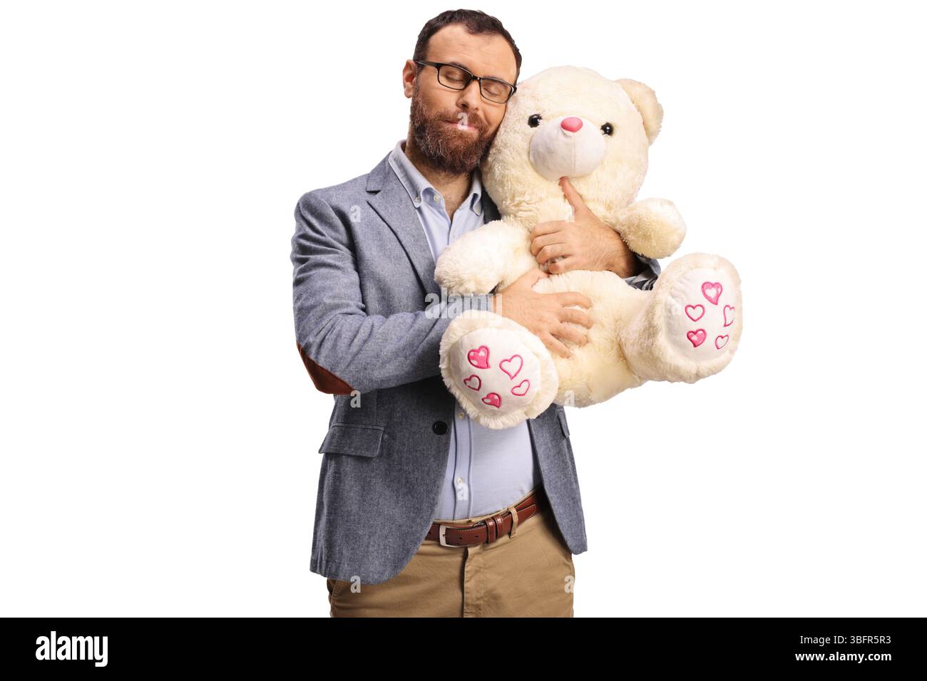 Bearded man hugging a teddy bear isolated on white background Stock ...
