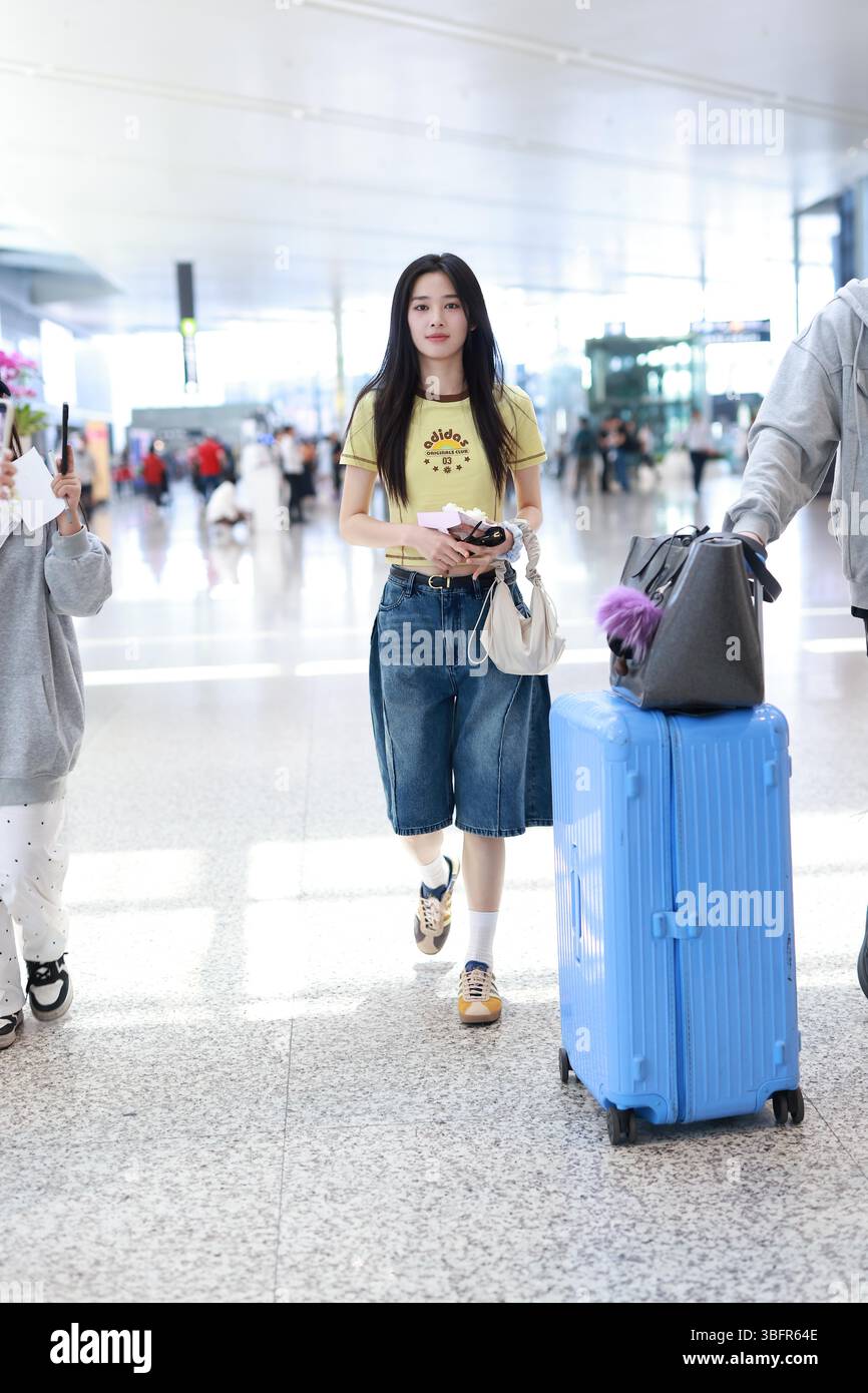 Chinese actress He Qiu appears at the airport in Shanghai, China, 30 May, 2025 Stock Photo - Alamy