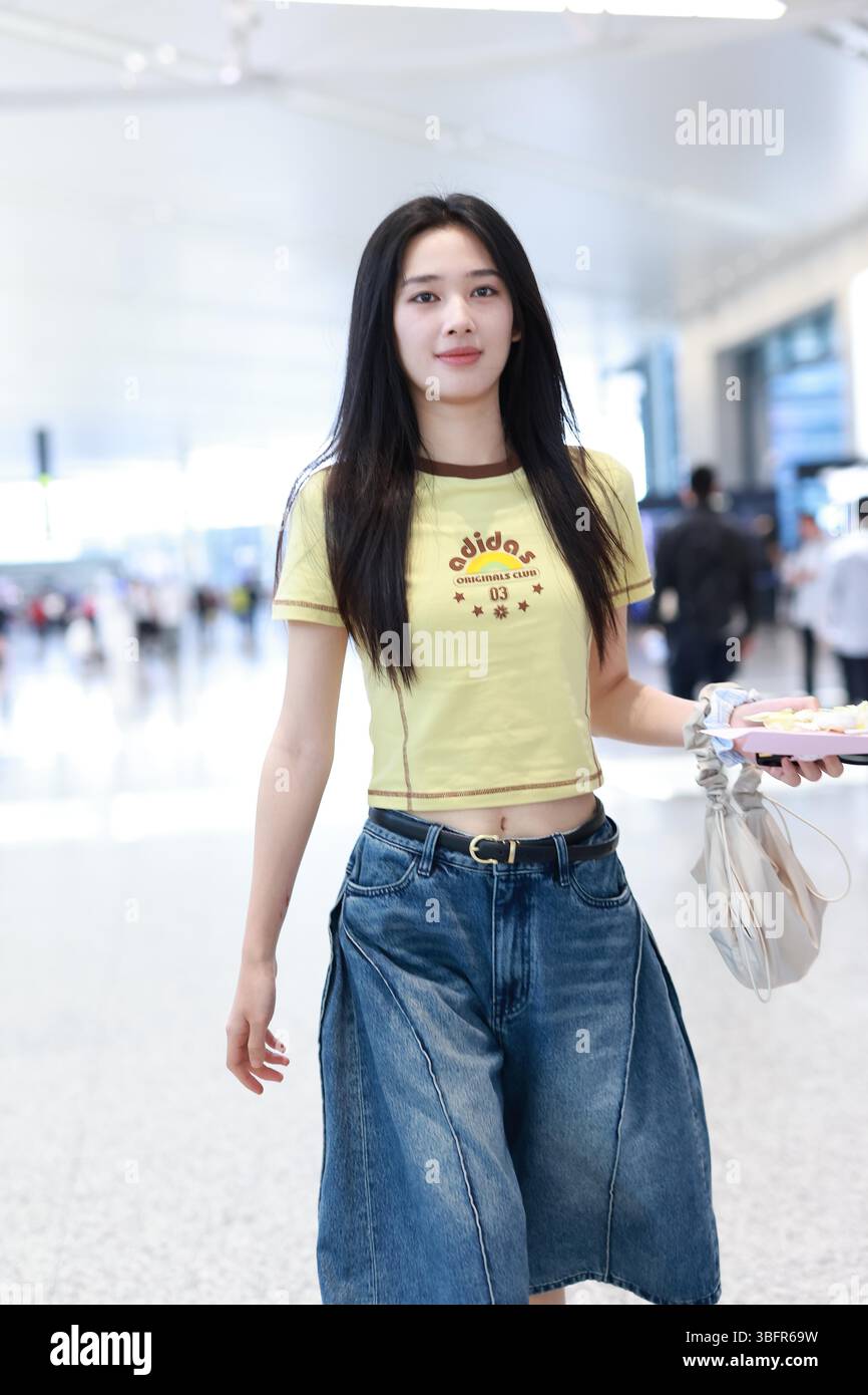 Chinese actress He Qiu appears at the airport in Shanghai, China, 30 ...