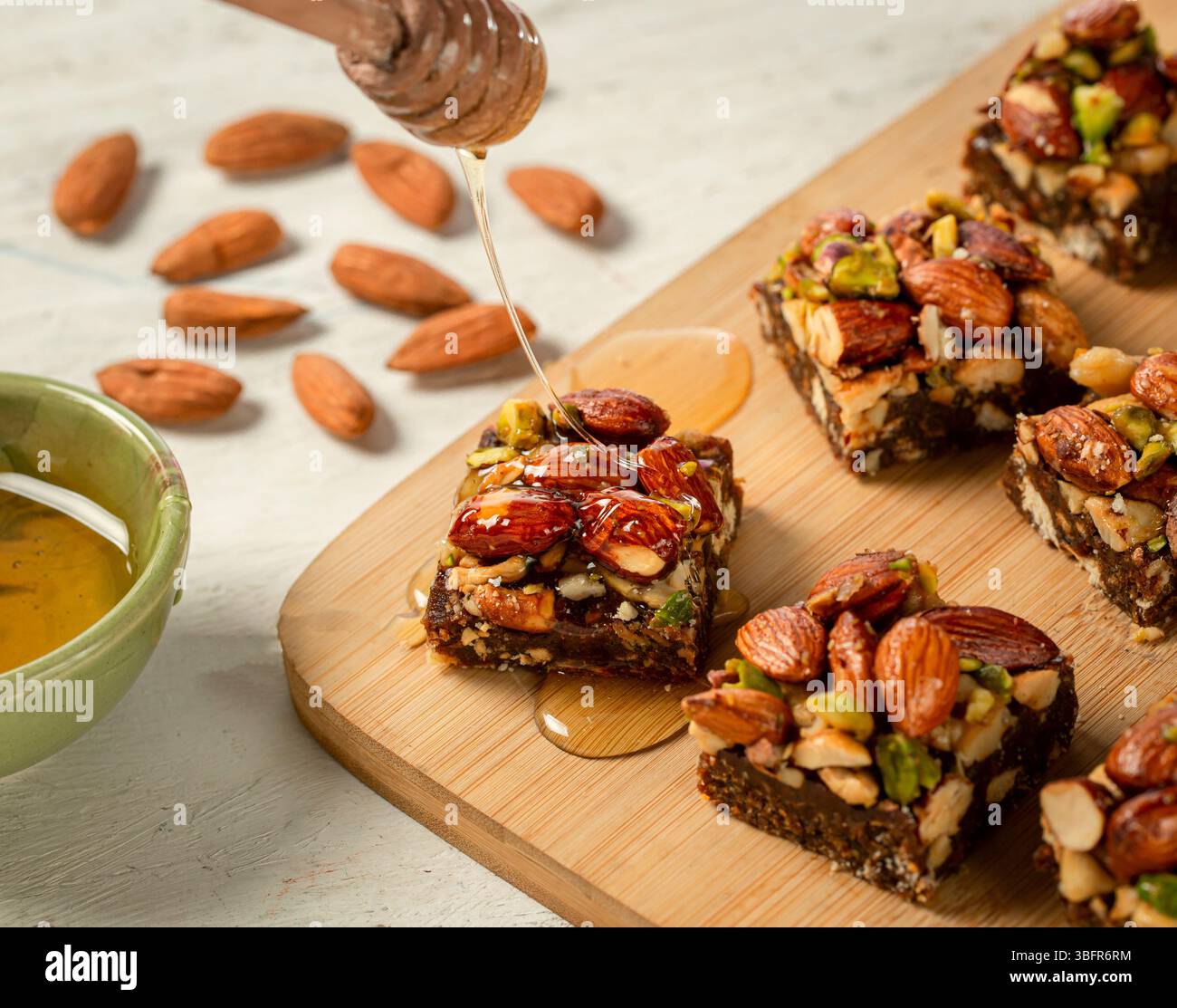 Close-up of Tamriya dessert with honey and mixed nuts, traditional ...
