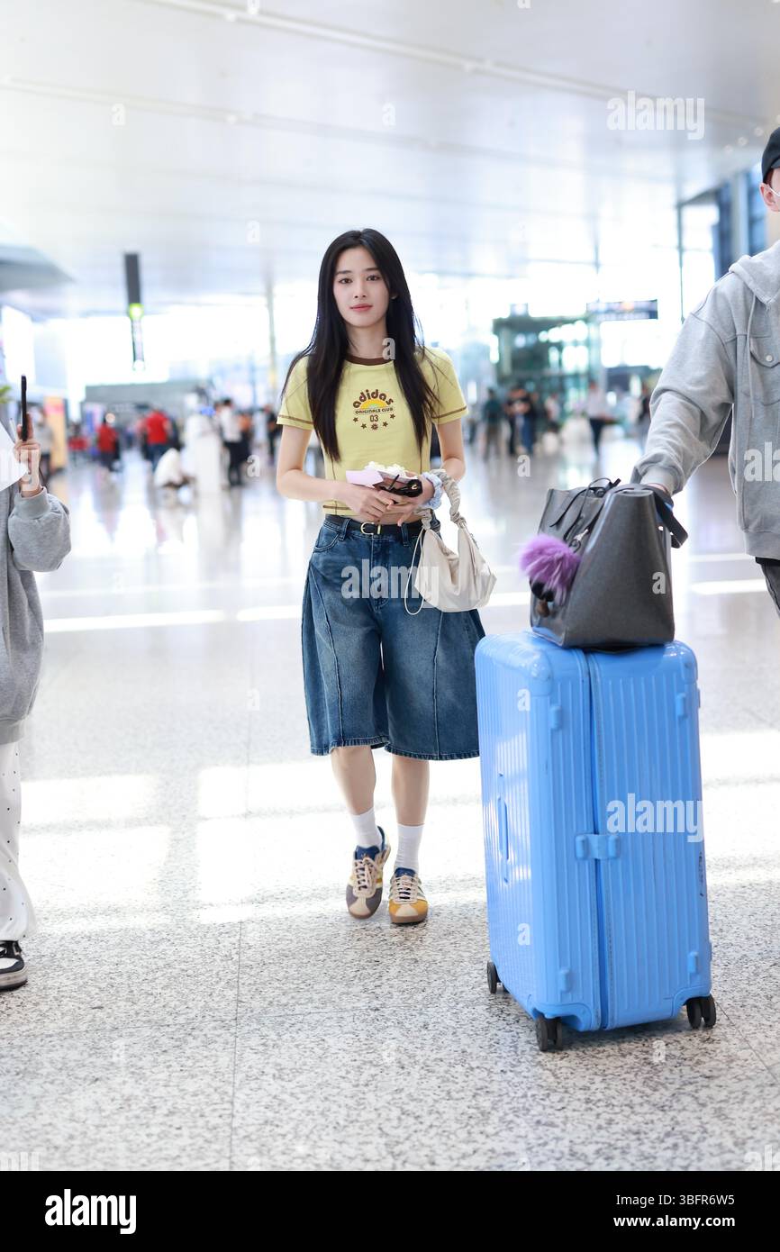 Chinese actress He Qiu appears at the airport in Shanghai, China, 30 ...