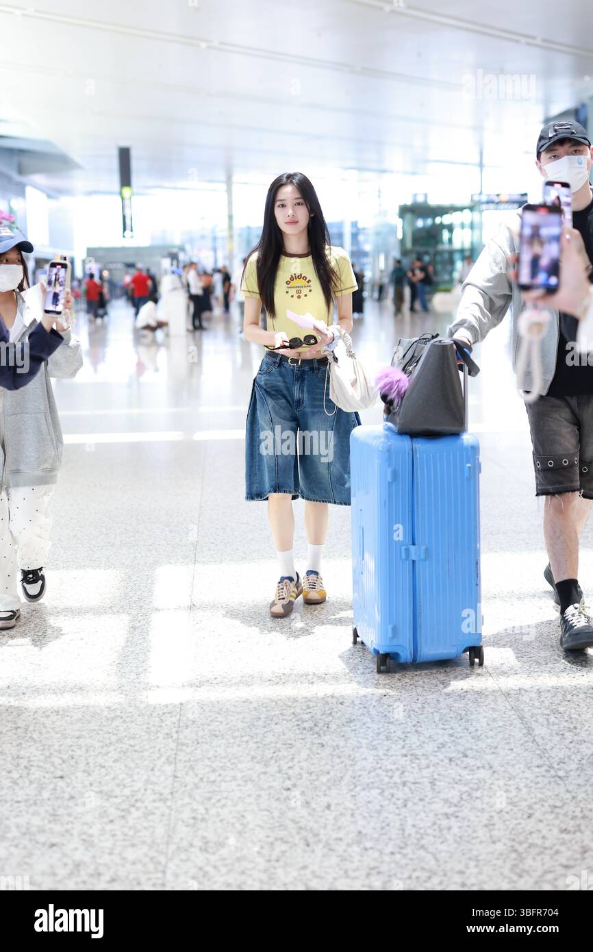 Chinese actress He Qiu appears at the airport in Shanghai, China, 30 ...