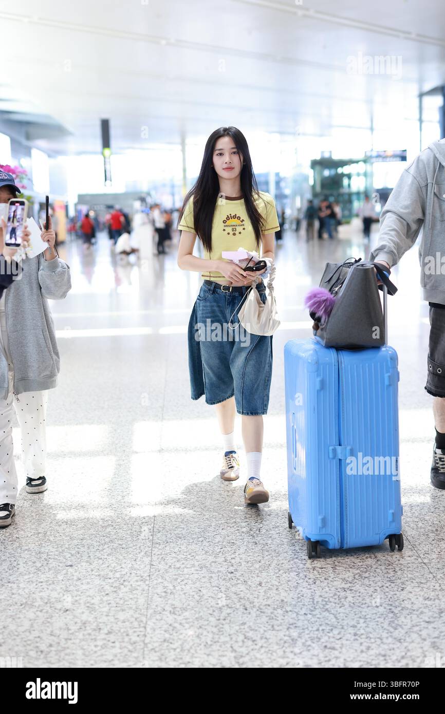 Chinese actress He Qiu appears at the airport in Shanghai, China, 30 ...