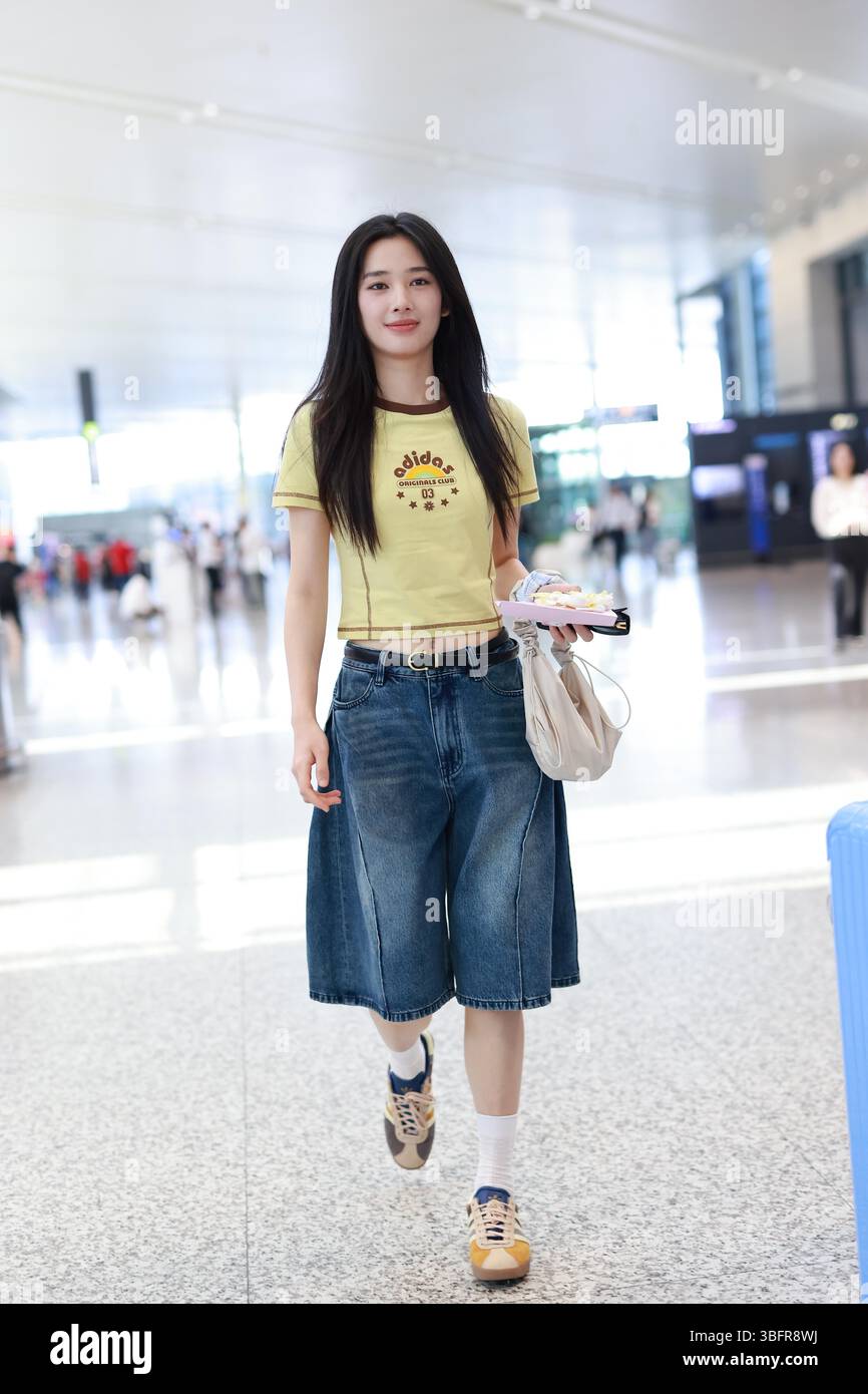 Chinese actress He Qiu appears at the airport in Shanghai, China, 30 ...