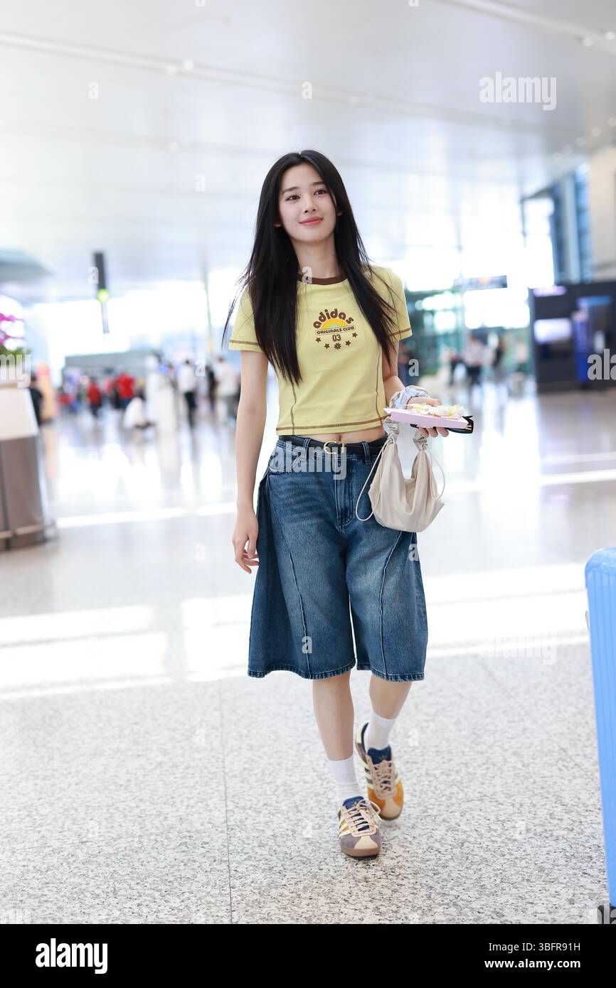 Chinese actress He Qiu appears at the airport in Shanghai, China, 30 May, 2025 Stock Photo - Alamy